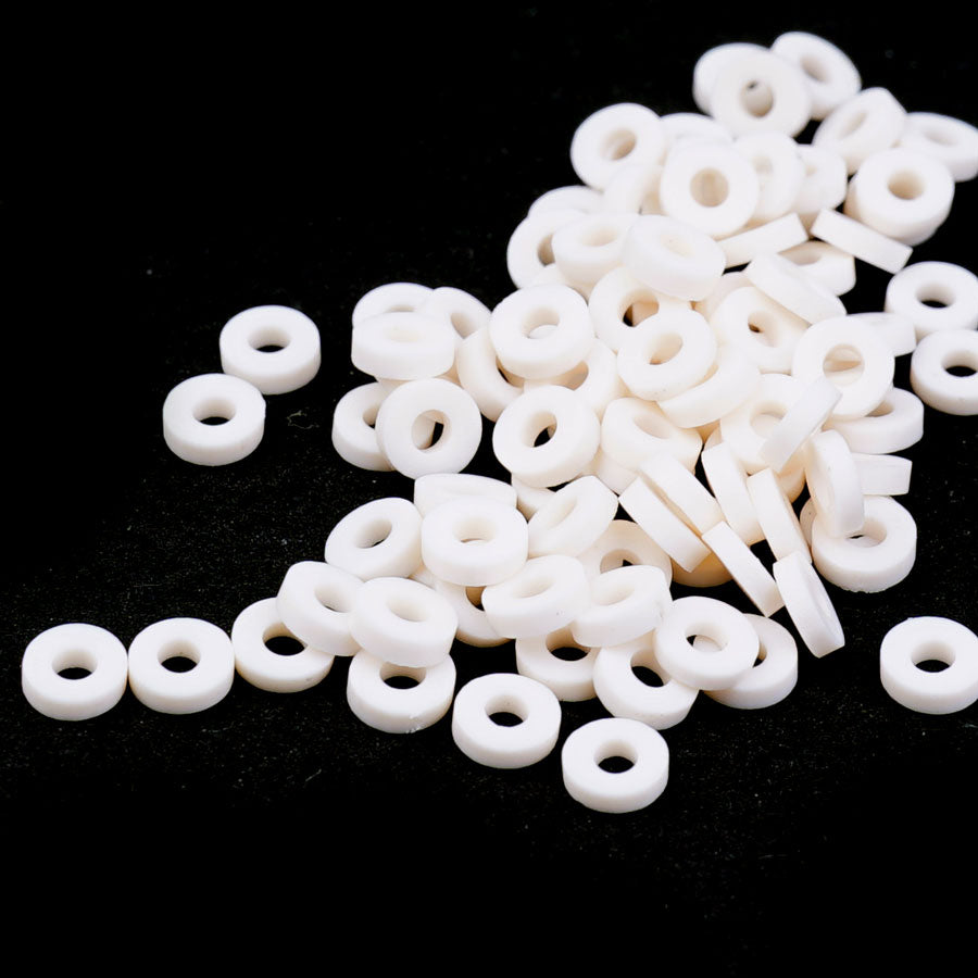 4mm Vinyl/Vulcanite Heishi Beads â€“ Pale Peach – Goody Beads